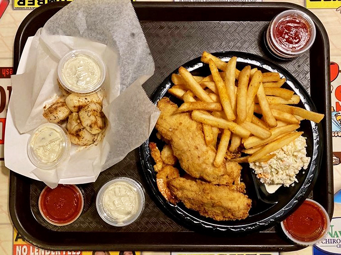 Golden-fried perfection meets crispy fries and creamy coleslaw. This isn't just a meal; it's the reason elastic-waist pants were invented.