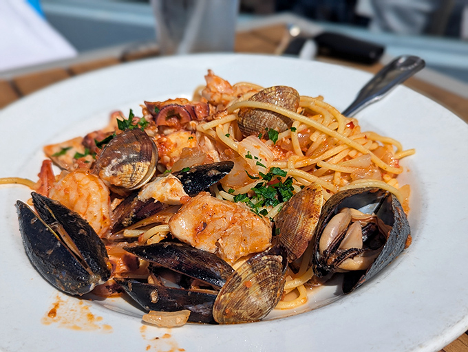 This seafood pasta isn't just a meal; it's a Mediterranean vacation where shellfish and noodles dance in perfect harmony.
