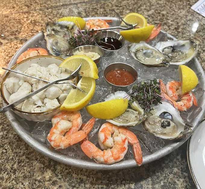 The seafood tower arrives like Neptune's personal calling card&mdash;oysters, shrimp, and crab nestled on ice with lemon wedges standing by for duty.