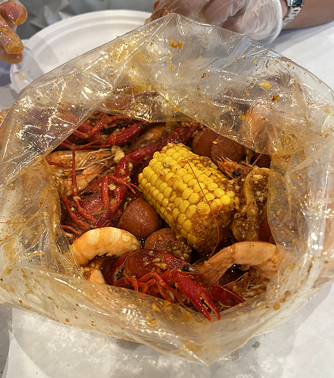 Behold the plastic bag of dreams! Crawfish, shrimp, corn, and potatoes swimming in flavor-packed sauce &ndash; nature's perfect one-bag meal.