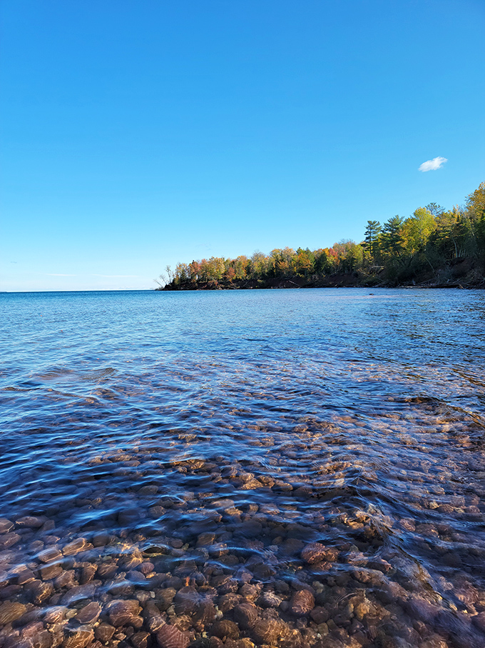Water so clear you'll check twice to make sure it's actually there. Lake Superior showing off its transparency like it's nothing, while mainland lakes hang their heads in shame.