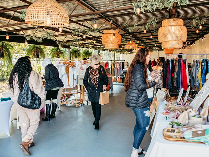 Savvy shoppers browse thoughtfully curated displays where yesterday's trends find new admirers. Fashion is truly circular, just like these bargains.