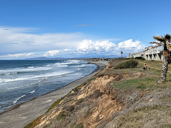 The coastline stretches like nature's infinity pool, where the horizon seems to whisper, "Come on in, the perspective is fine."