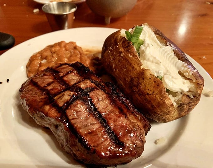 This isn't just a steak; it's a masterpiece of marbling with perfect grill marks that whisper, "Your diet starts tomorrow."