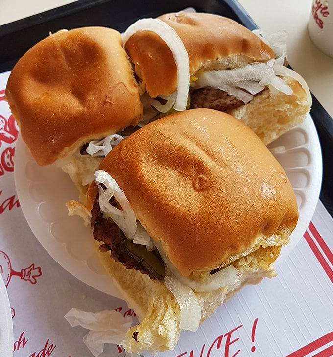 These aren't just sliders; they're time machines on a bun. Notice how the onions peek out, promising that perfect savory crunch.