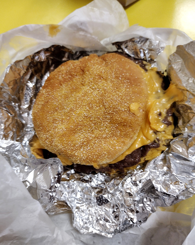 Wrapped in foil like a present from the cheese gods, this burger means serious business.