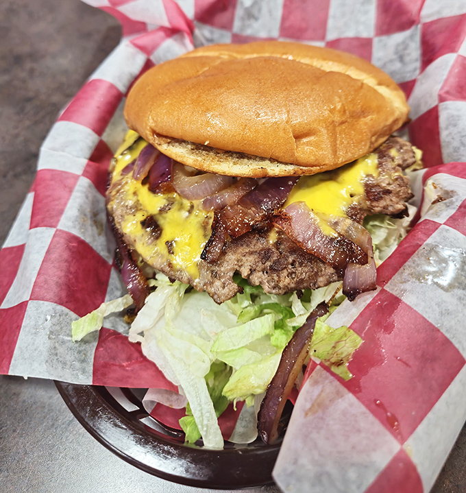 This isn't just a burger; it's a manifesto of beef, bacon, and cheese that makes fancy steakhouse offerings seem unnecessarily complicated.