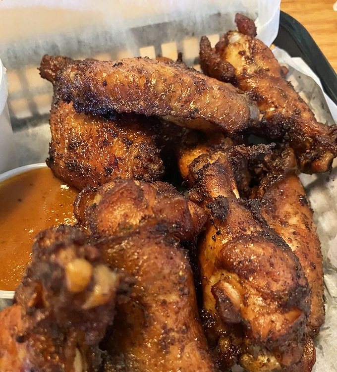 These wings achieved that coveted mahogany glow that barbecue dreams are made of &ndash; pure smoky perfection.