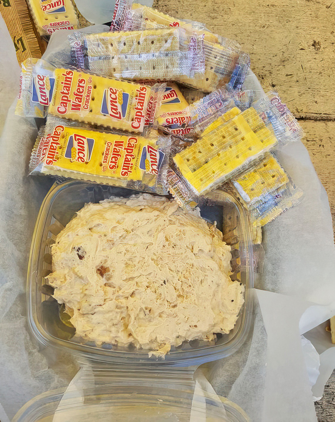 The legendary smoked mahi dip arrives with humble crackers, like a superstar who doesn't need fancy clothes to shine.