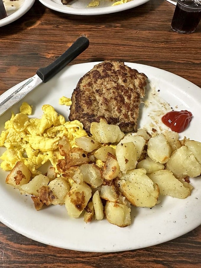 Breakfast perfection doesn't need fancy plating &ndash; just perfectly cooked eggs, crispy hash browns, and sausage that means business.