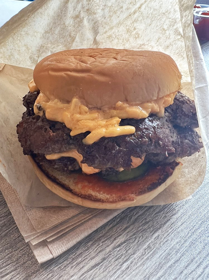This isn't just a burger, it's a masterpiece of beef architecture &ndash; with crispy edges, melty cheese, and special sauce that'll haunt your dreams.