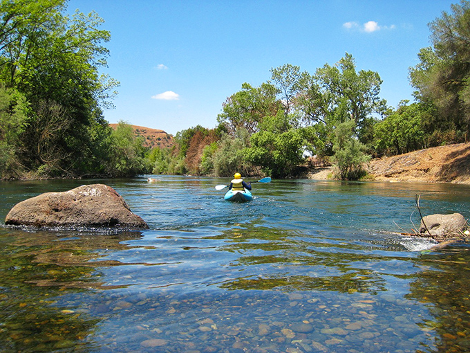 The Stanislaus River offers nature's air conditioning&mdash;a crystal-clear respite where kayakers discover why locals treasure this waterway as Oakdale's liquid gold.