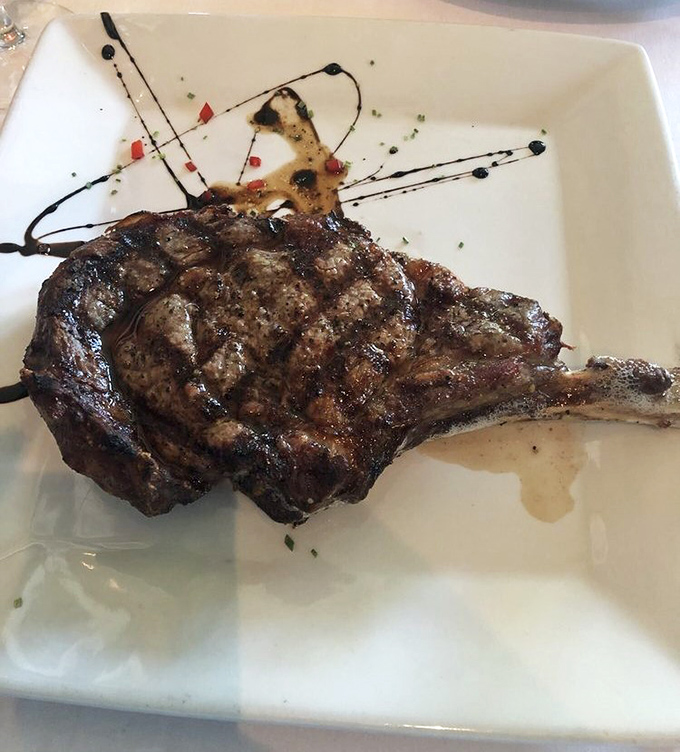 This isn't just a steak; it's a masterpiece with grill marks. The artistic balsamic drizzle adds both visual drama and flavor complexity.