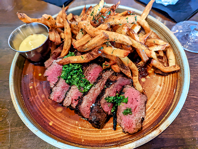 Perfectly pink steak, herb-flecked truffle fries, and a sauce that should be illegal in seven states. This plate doesn't need a filter&mdash;it needs a moment of silence.