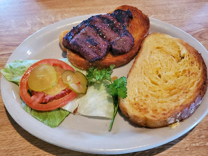 Behold the sandwich that's converting vegetarians faster than a tent revival &ndash; pure grilled perfection on bread.