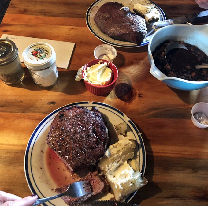 Inside, every inch of wall space tells a story. This isn't manufactured rustic&mdash;it's the real deal, worn smooth by generations of hungry travelers.