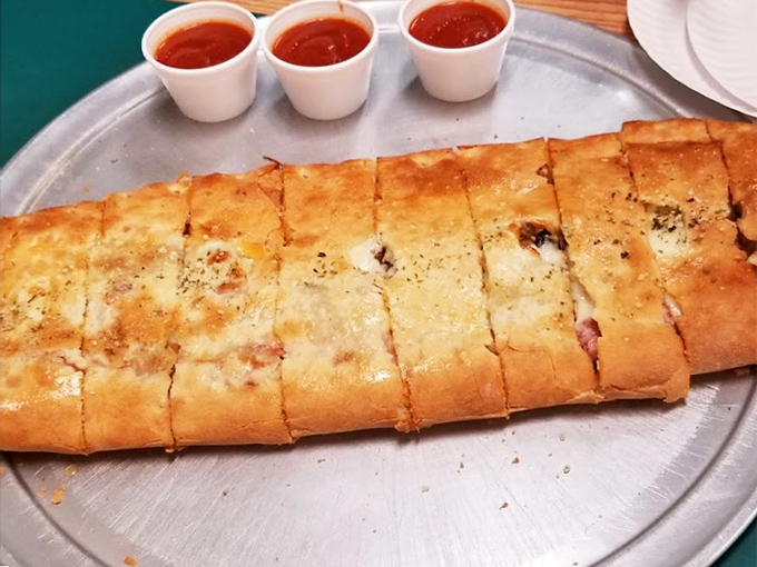 Behold the stromboli in all its golden glory &ndash; a perfectly sealed envelope of deliciousness that delivers better news than your tax refund.