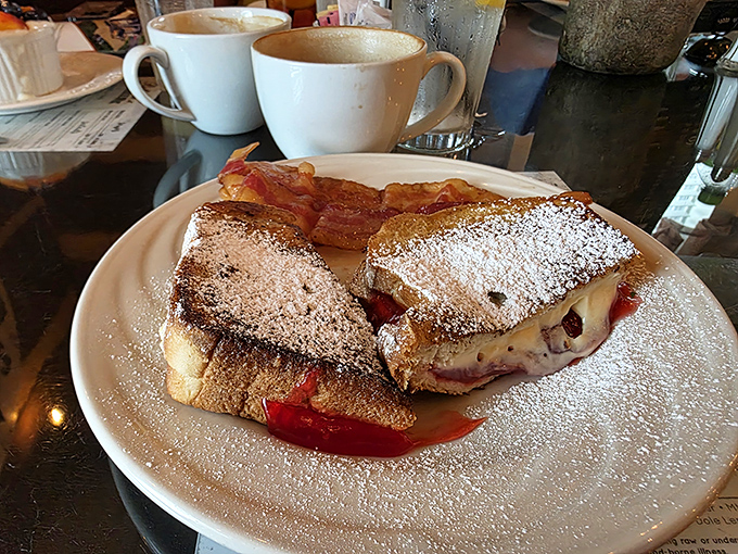 Behold the French toast that launched a thousand return trips - thick, golden, and utterly irresistible.