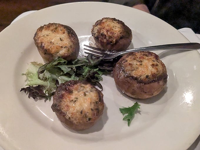 These aren't just stuffed mushrooms &ndash; they're edible treasure chests. Each golden-brown cap delivers a payload of savory filling that'll haunt your dreams.