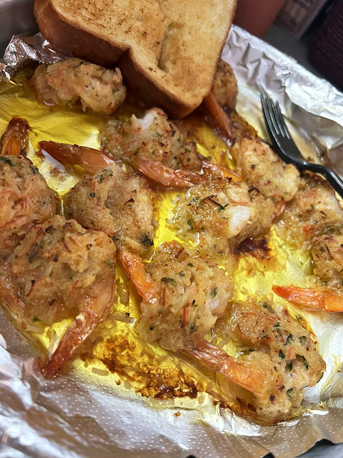 These stuffed shrimp aren't just appetizers, they're little seafood love letters swimming in butter that would make Julia Child weep with joy.