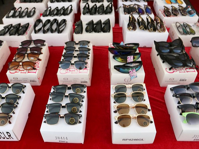 Sunglasses galore! Like a casting call for cool, these shades wait patiently for their chance to protect your eyes in style.
