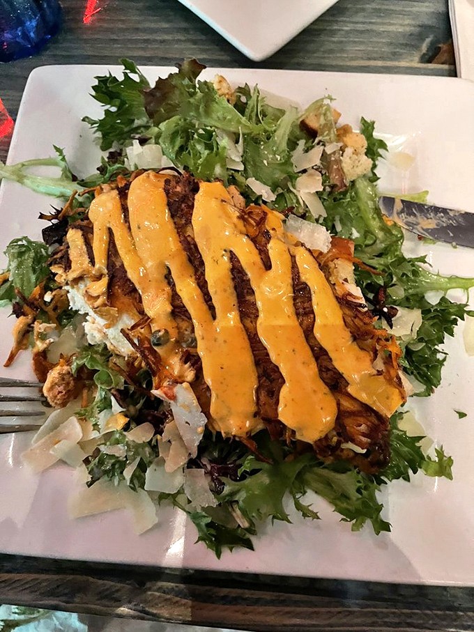 Sweet potato crust creates a golden armor around perfectly cooked fish, like nature's candy coating decided to go savory and never looked back.