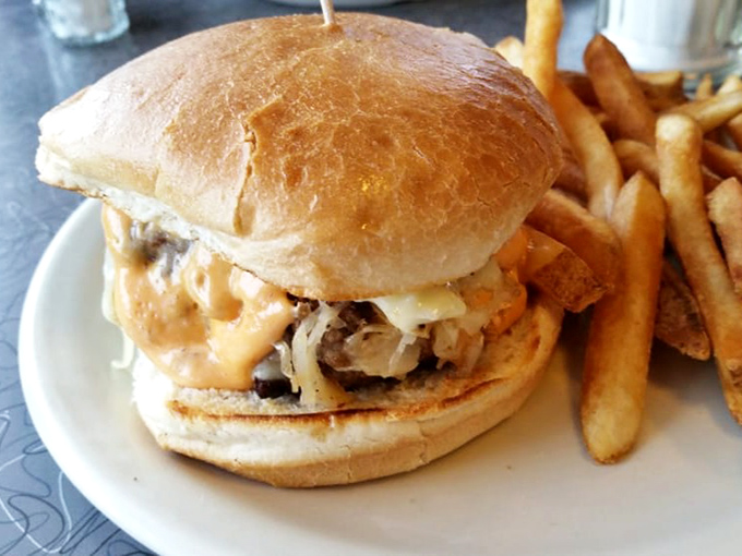 The legendary Swiss burger in all its glory&mdash;a masterpiece of melted cheese cascading over a perfectly charred patty. Worth every mile of the journey.
