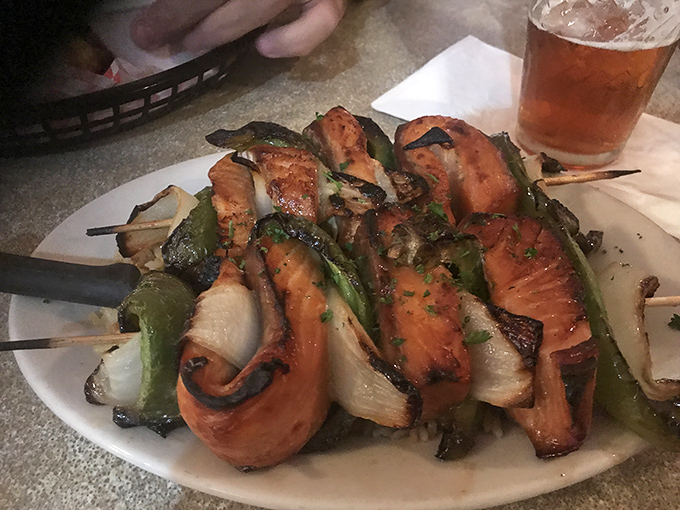 Teriyaki salmon skewers that could make a pescatarian weep with joy. The char marks aren't just decoration&mdash;they're flavor's autograph on each piece.