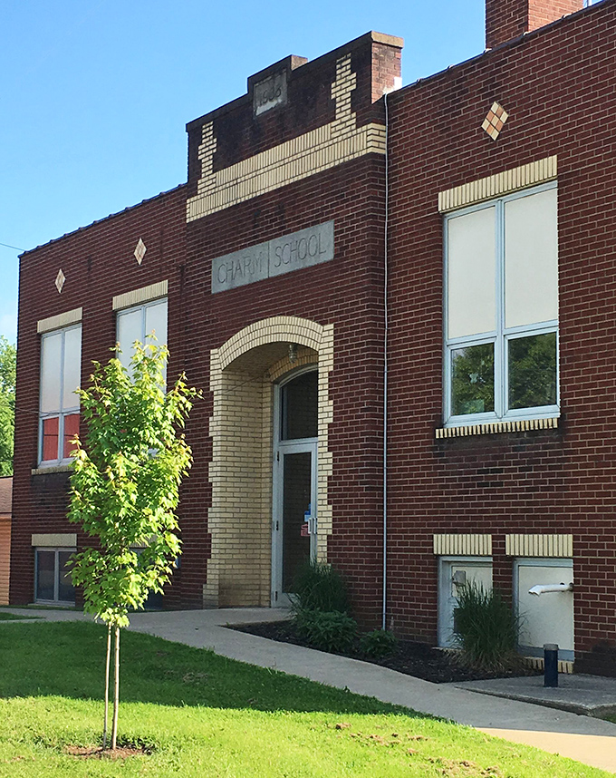 The Charm School building stands as a brick-and-mortar reminder that education has always been valued here, even as lifestyles remain delightfully analog.