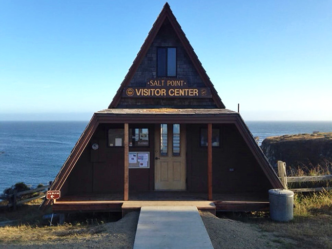 The A-frame visitor center stands like a quirky sentinel at the edge of the continent, offering maps and the last flush toilet you'll see for miles.