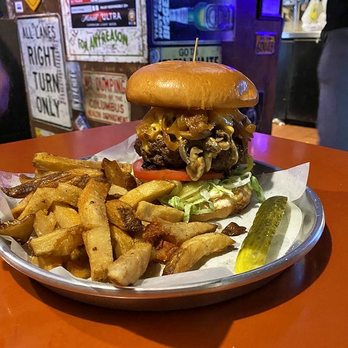 Behold the Thurman burger, where architectural engineering meets pure delicious madness on a plate.