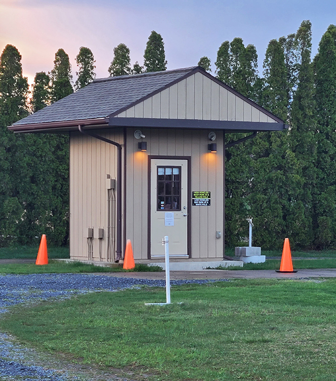 The ticket booth stands sentinel like a time capsule, ready to stamp your passport to an evening of retro entertainment.