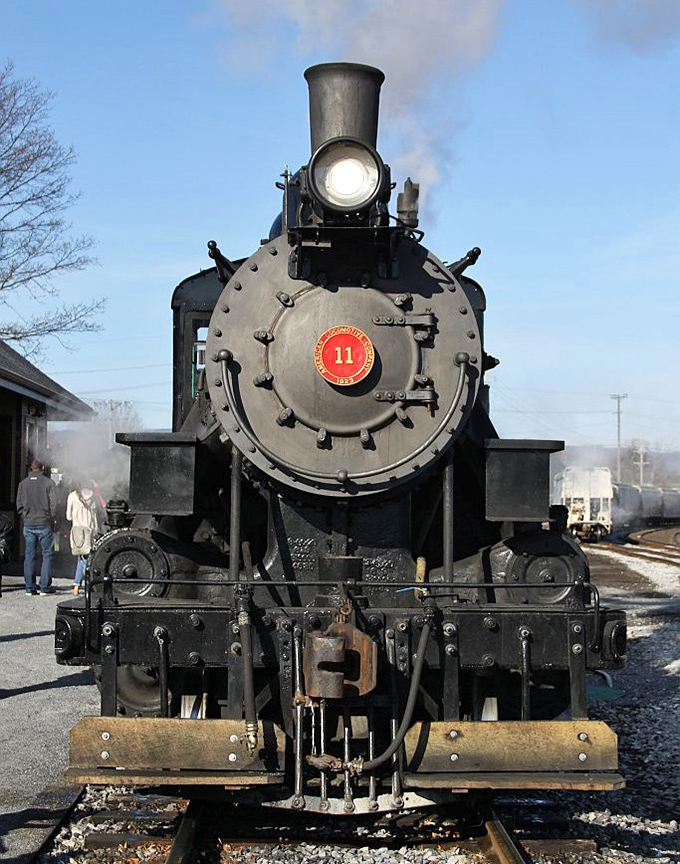 Face to face with history: the locomotive's front view reveals the intricate engineering marvel that once connected America, now preserved for your wonder.