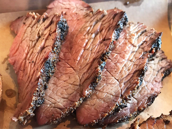 This tri-tip isn't just cooked, it's been given a PhD in deliciousness &ndash; notice that perfect pink center surrounded by that heavenly bark.