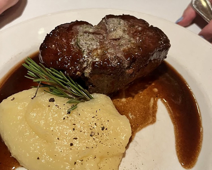 This filet isn't just dinner; it's a meditation on perfection. The mashed potatoes aren't playing supporting actor&mdash;they're co-starring.