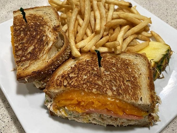The legendary tuna melt in its full glory – perfectly golden bread embracing that magical union of tuna and melted cheese. Worth crossing town for.