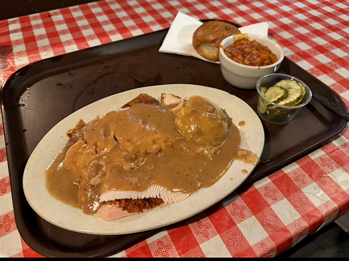 Turkey that actually tastes like turkey, swimming in gravy that could make a vegetarian question their life choices.