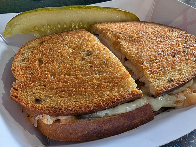Behold the Turkey Reuben: where golden rye bread cradles perfection between its toasted embrace.