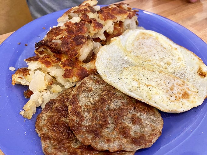 The star of the show: turkey sausage patties with the perfect sear, alongside potatoes that didn't just fall off the truck&mdash;they were loved into crispness.