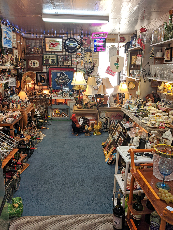 A collector's fever dream! This booth is the physical manifestation of "one person's clutter is another's collection" – with beer signs to boot.