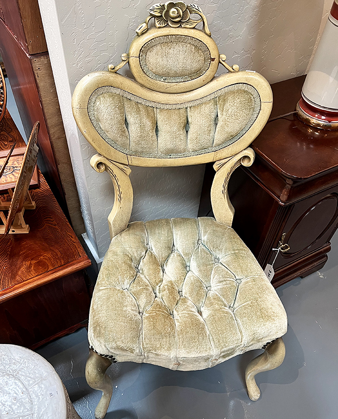 Victorian elegance meets modern treasure hunting. This tufted chair isn't just seating—it's a throne for someone's reading nook waiting to happen.