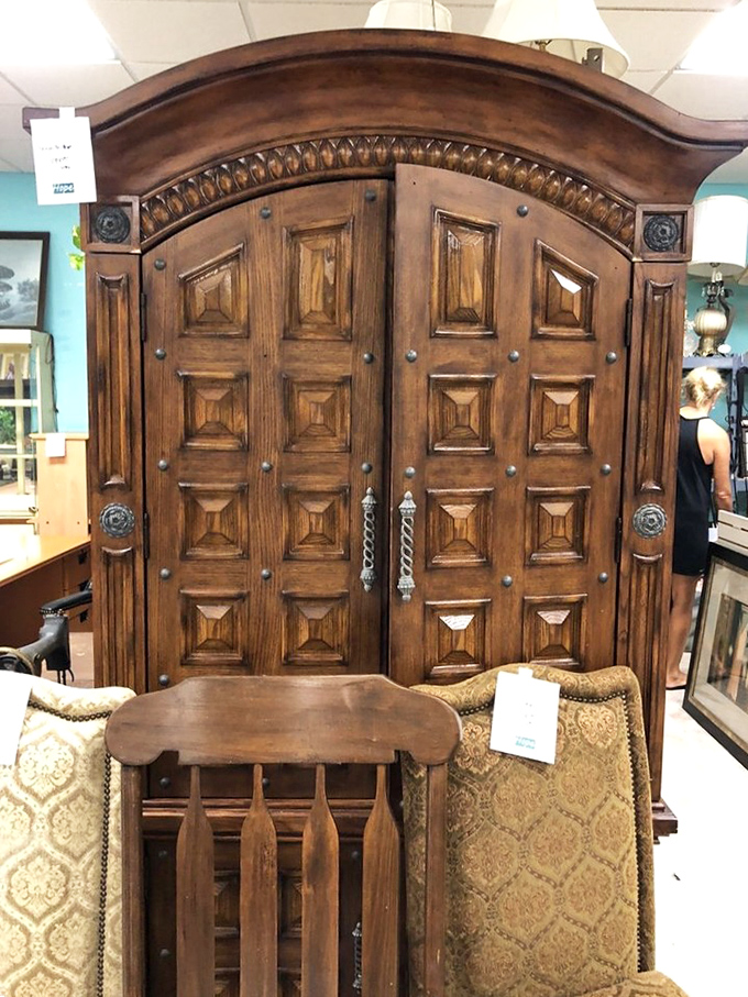 This isn't just a wooden armoire&mdash;it's a portal to Narnia at bargain prices. Carved with the kind of craftsmanship that makes modern furniture weep with inadequacy.