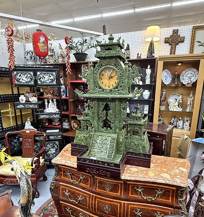 This ornate jade-colored clock isn't just telling time&mdash;it's a conversation piece that would make even the Addams Family jealous.