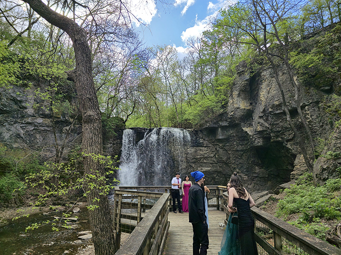 Formal attire meets formal nature! Even dressed in their finest, these visitors couldn't resist the magnetic pull of Hayden Falls' dramatic backdrop.