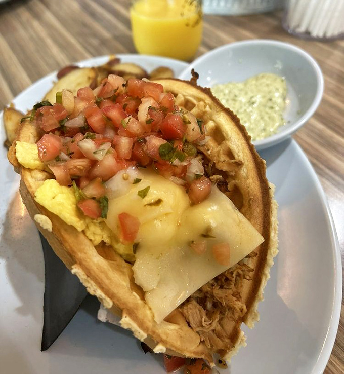 The legendary waffle taco in its natural habitat&mdash;crispy yet pliable, loaded with pulled pork, eggs, cheese, and pico de gallo. Breakfast engineering at its finest.