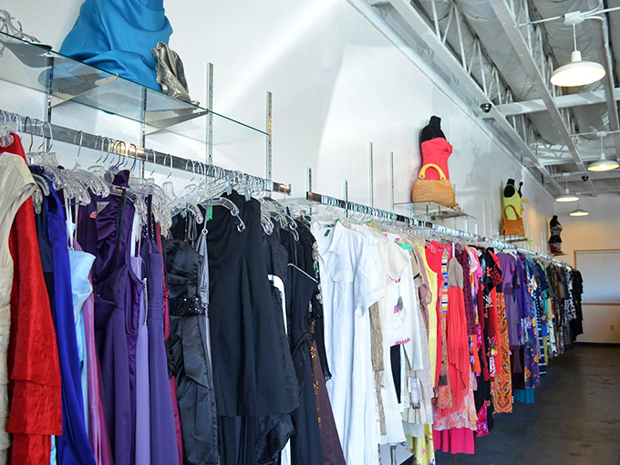 A rainbow of possibilities hangs in perfect chromatic order. Fashion's greatest hits, preserved in time, waiting for their encore performance.