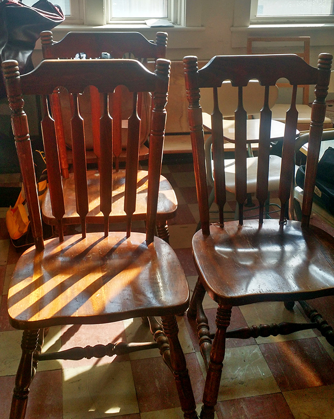 These aren't just chairs; they're time machines with armrests. Solid wood craftsmanship that's outlasted several smartphone generations and counting.