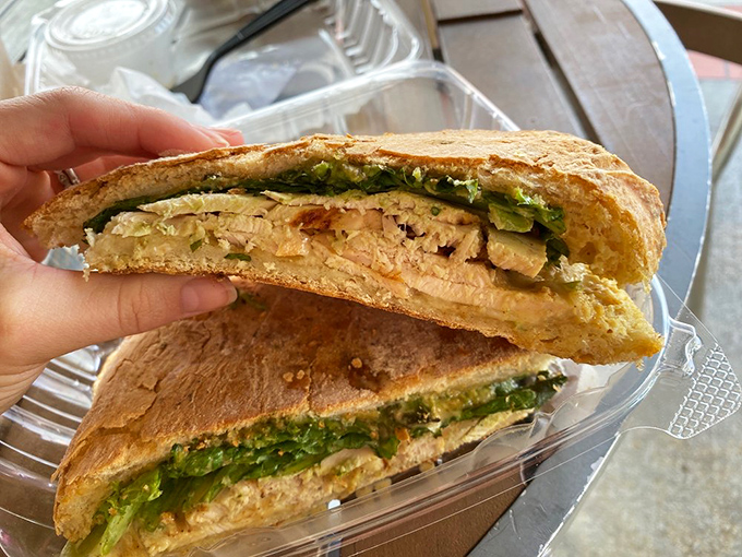 Behold the star attraction: layers of creamy avocado and tender chicken embraced by artisanal bread. This sandwich doesn't just satisfy hunger—it creates joy.