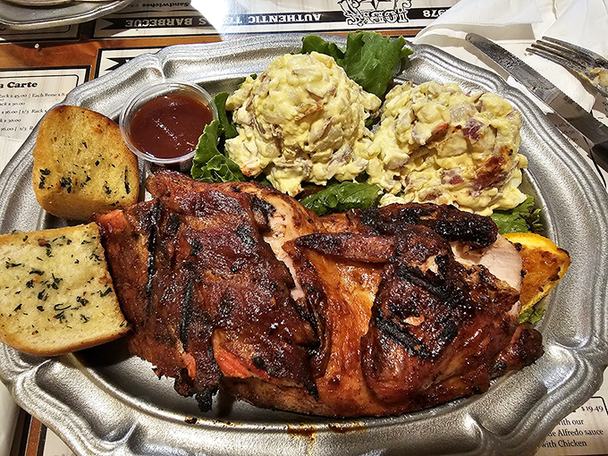 Barbecue chicken that's had a proper introduction to smoke, served with potato salad that could make anyone from anywhere weep with joy.