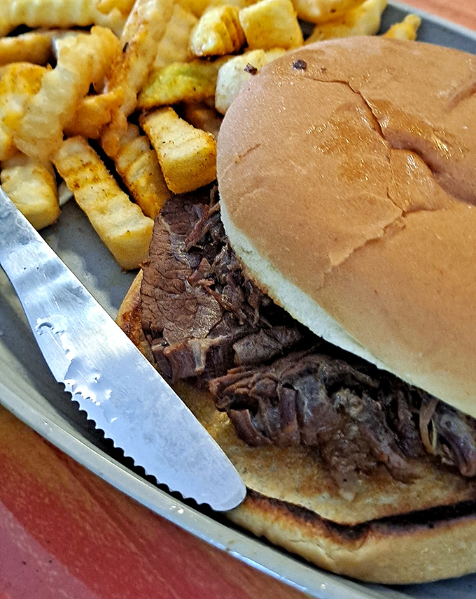 Behold the sandwich that launched a thousand road trips – worth every glorious, messy bite.